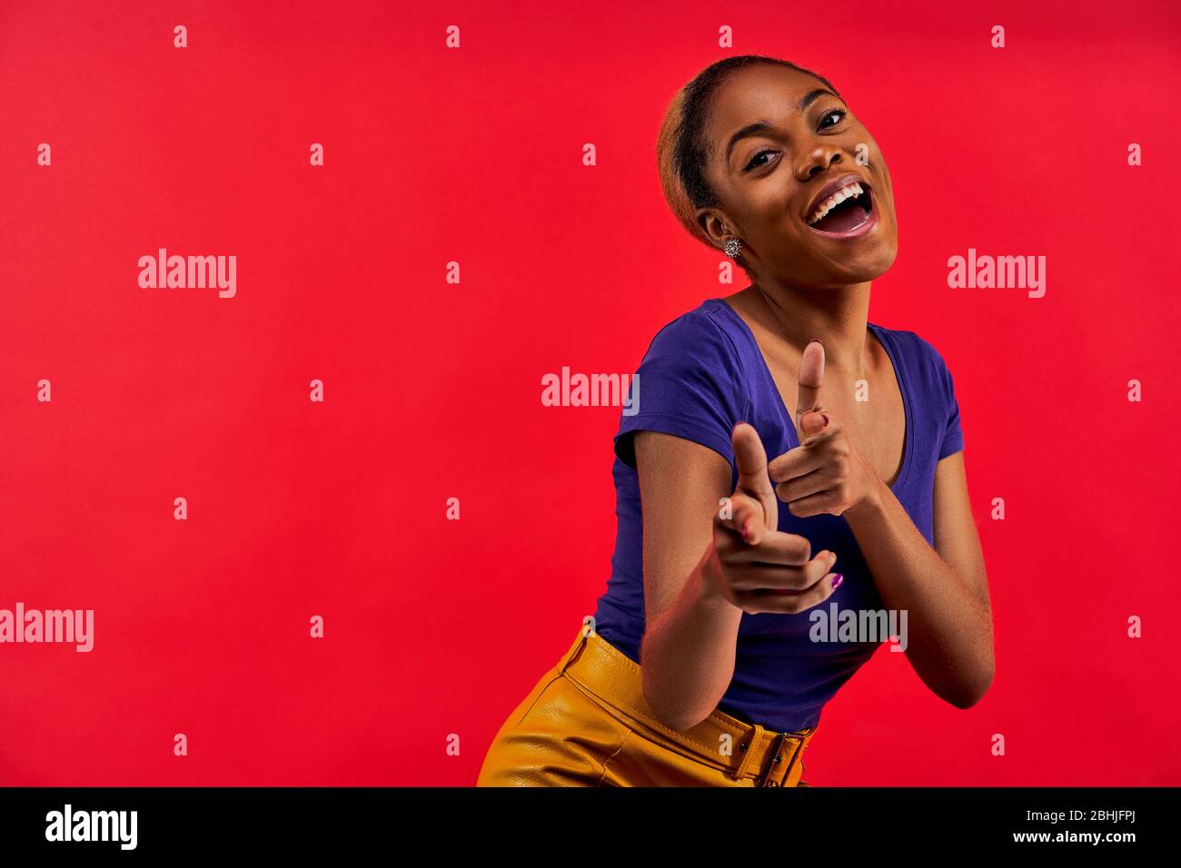 Woman points camera hi-res stock photography and images - Alamy