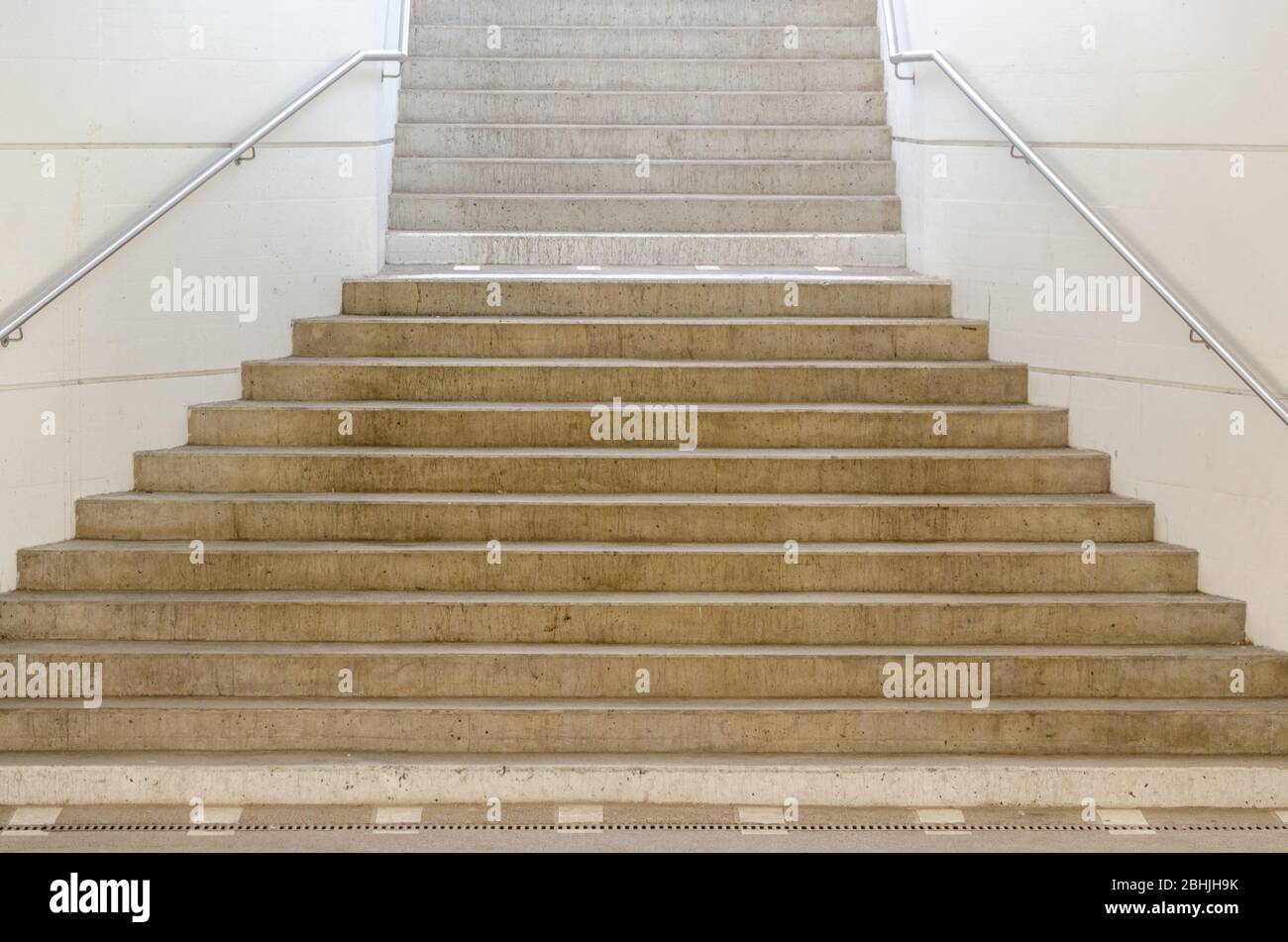 Simple view of a symmetric staircase with railing on each sides Stock ...