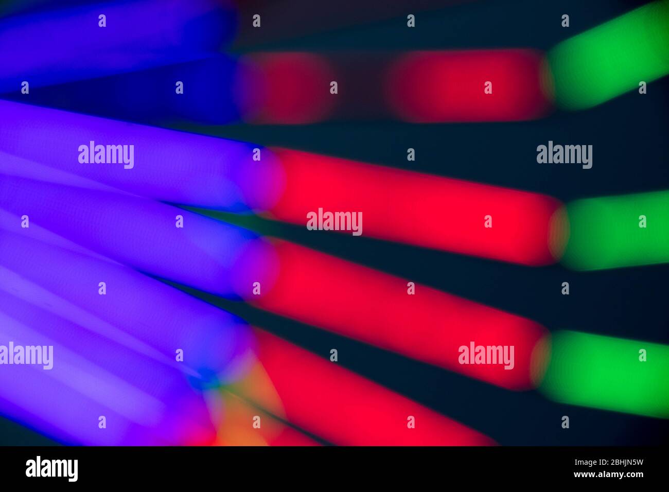 Abstract multi color of glow fluorescent on black background Stock ...