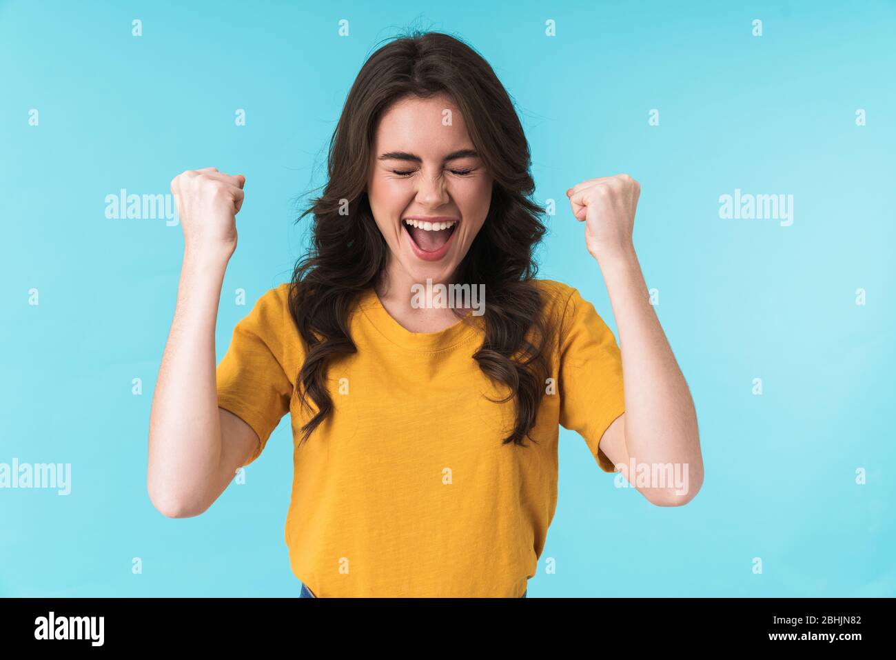 Image of a screaming optimistic young pretty woman posing isolated over ...
