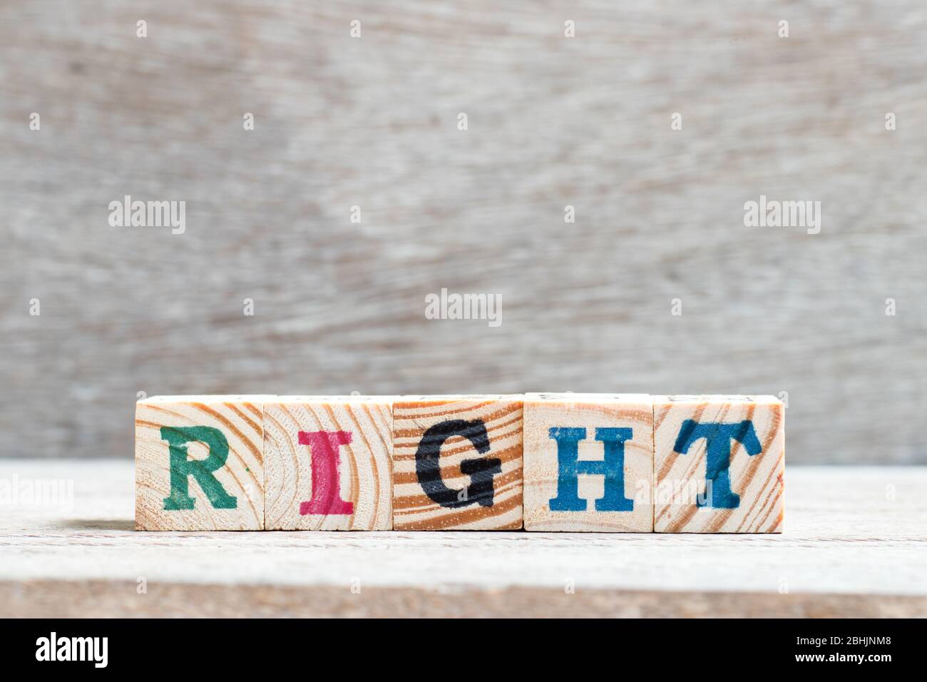 Letter block in word right on wood background Stock Photo - Alamy