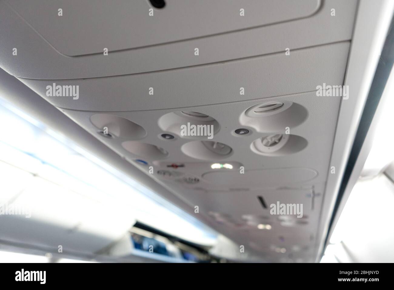 Control panel for ventilation and lighting in a passenger seat in an ...