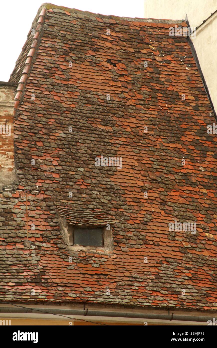 Original tiled roof of century old building in Sibiu, Romania Stock ...