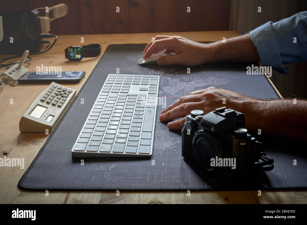 Smiling photographer editing desk hi-res stock photography and images ...