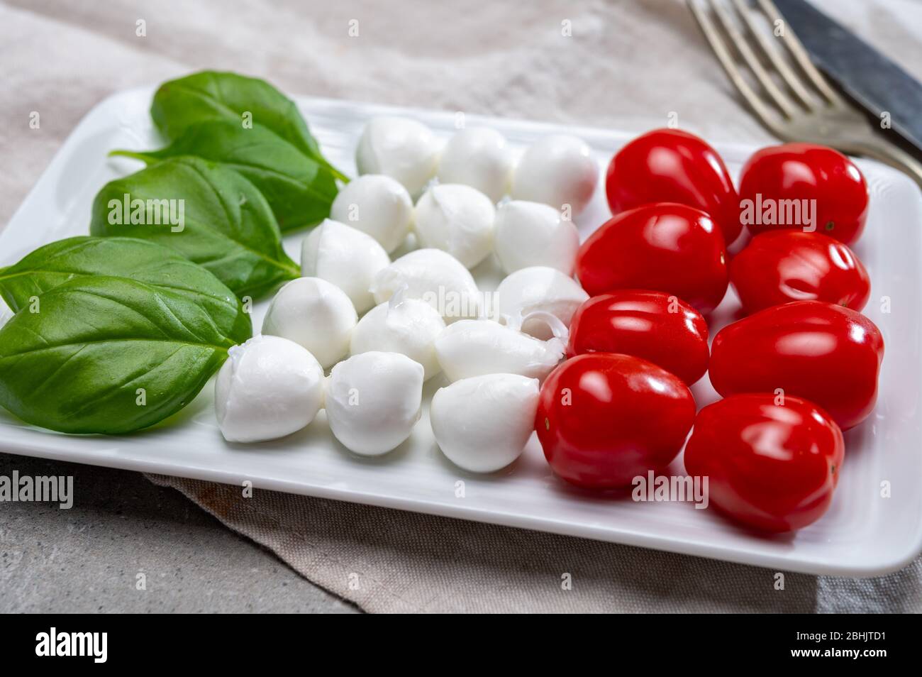 Italian food served as flag of Italy Tricolore with fresh fresh green ...