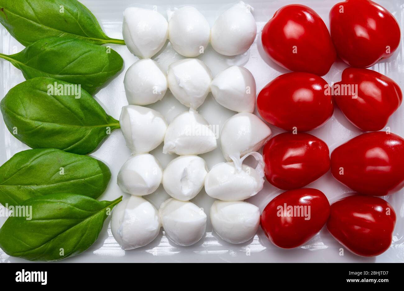Italian food served as flag of Italy Tricolore with fresh fresh green ...