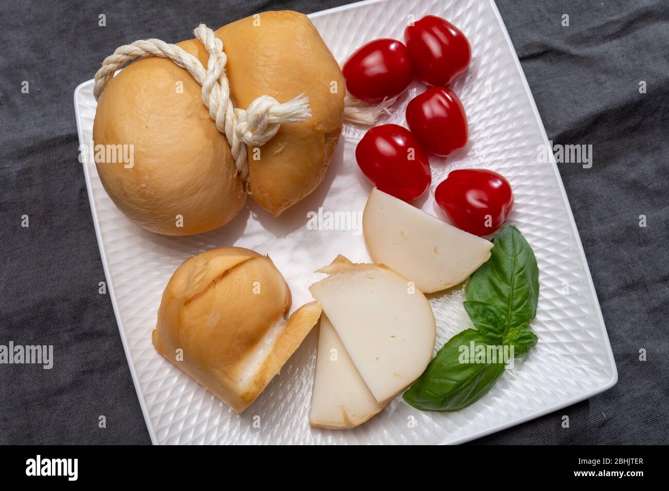 Italian semi hard handmade smoked scamorza cheese, from cow milk from ...