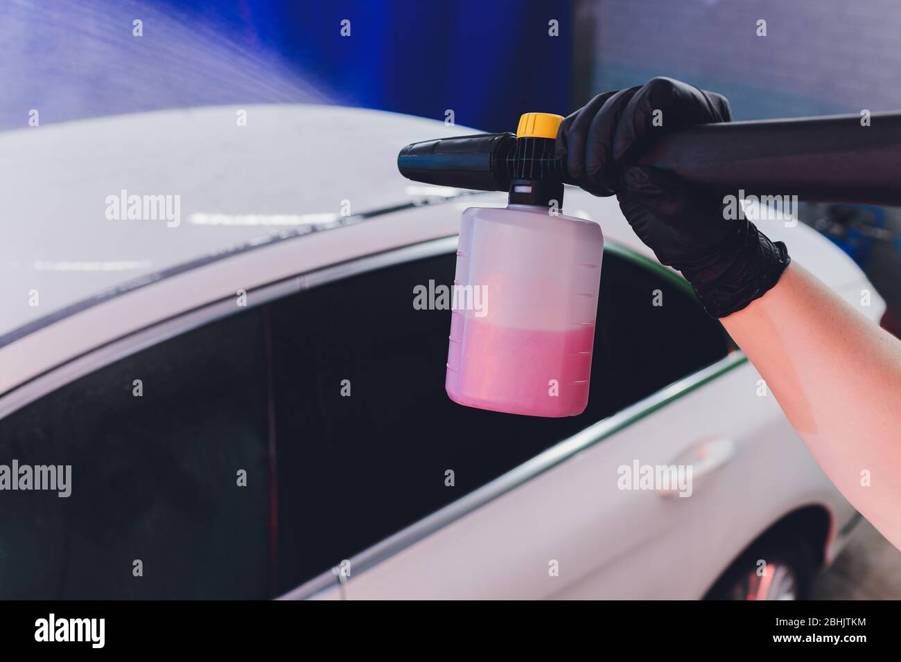 Close up cleaning car using high pressure water,High pressure jet ...