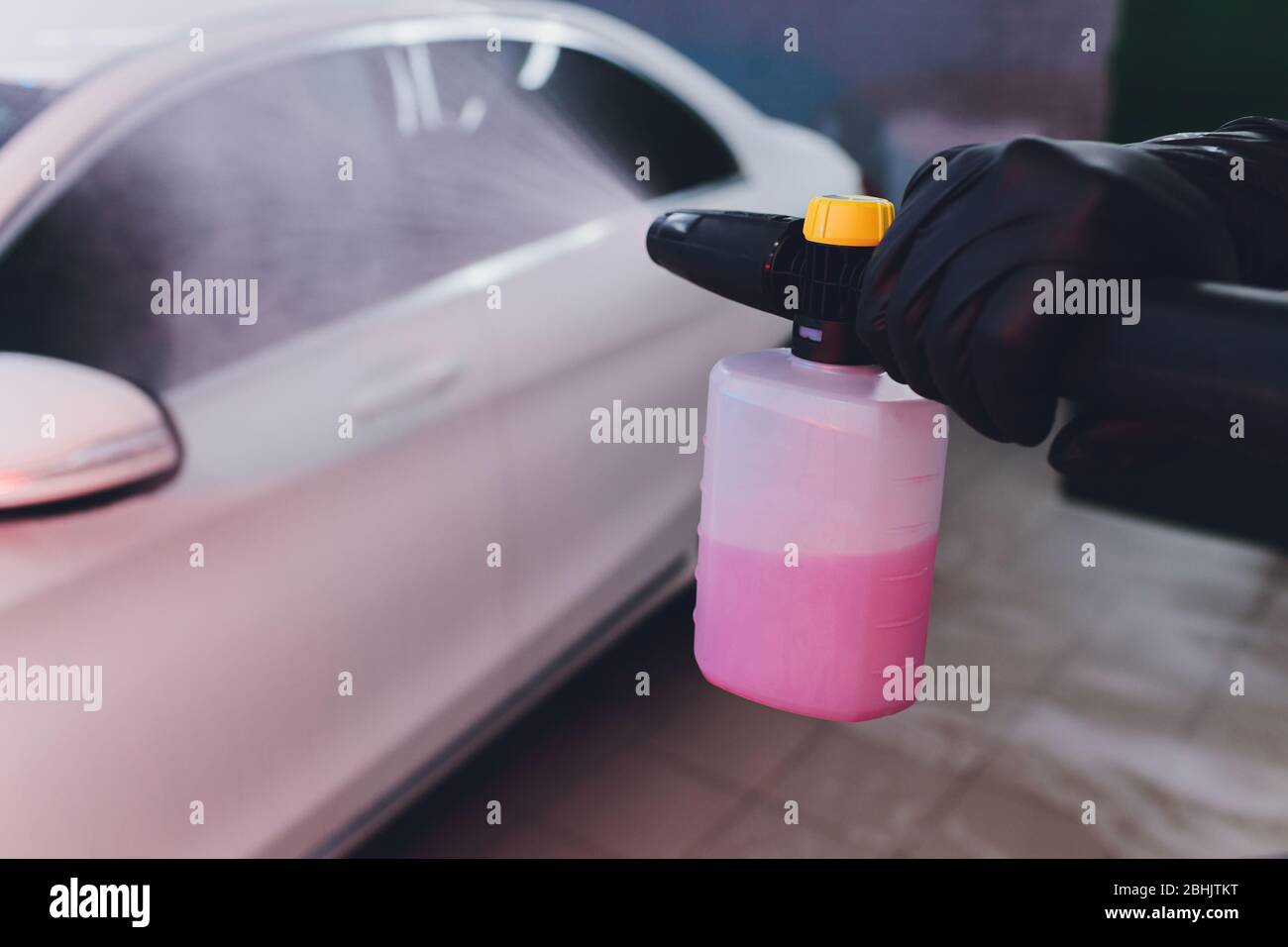 Close up cleaning car using high pressure water,High pressure jet ...