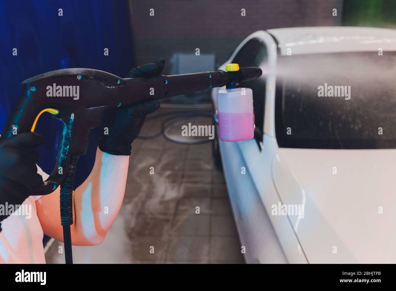 Close up cleaning car using high pressure water,High pressure jet ...