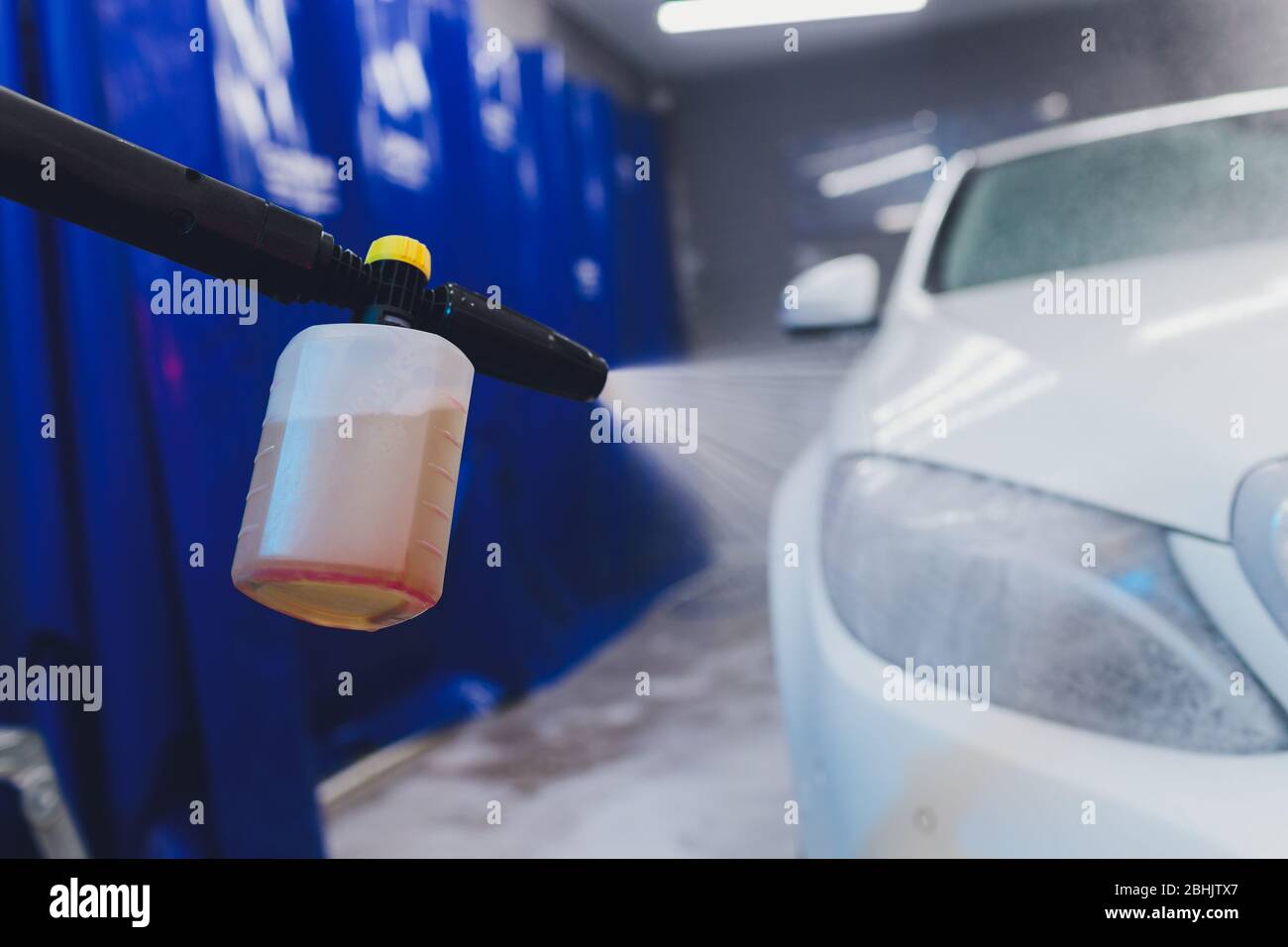 Close up cleaning car using high pressure water,High pressure jet ...