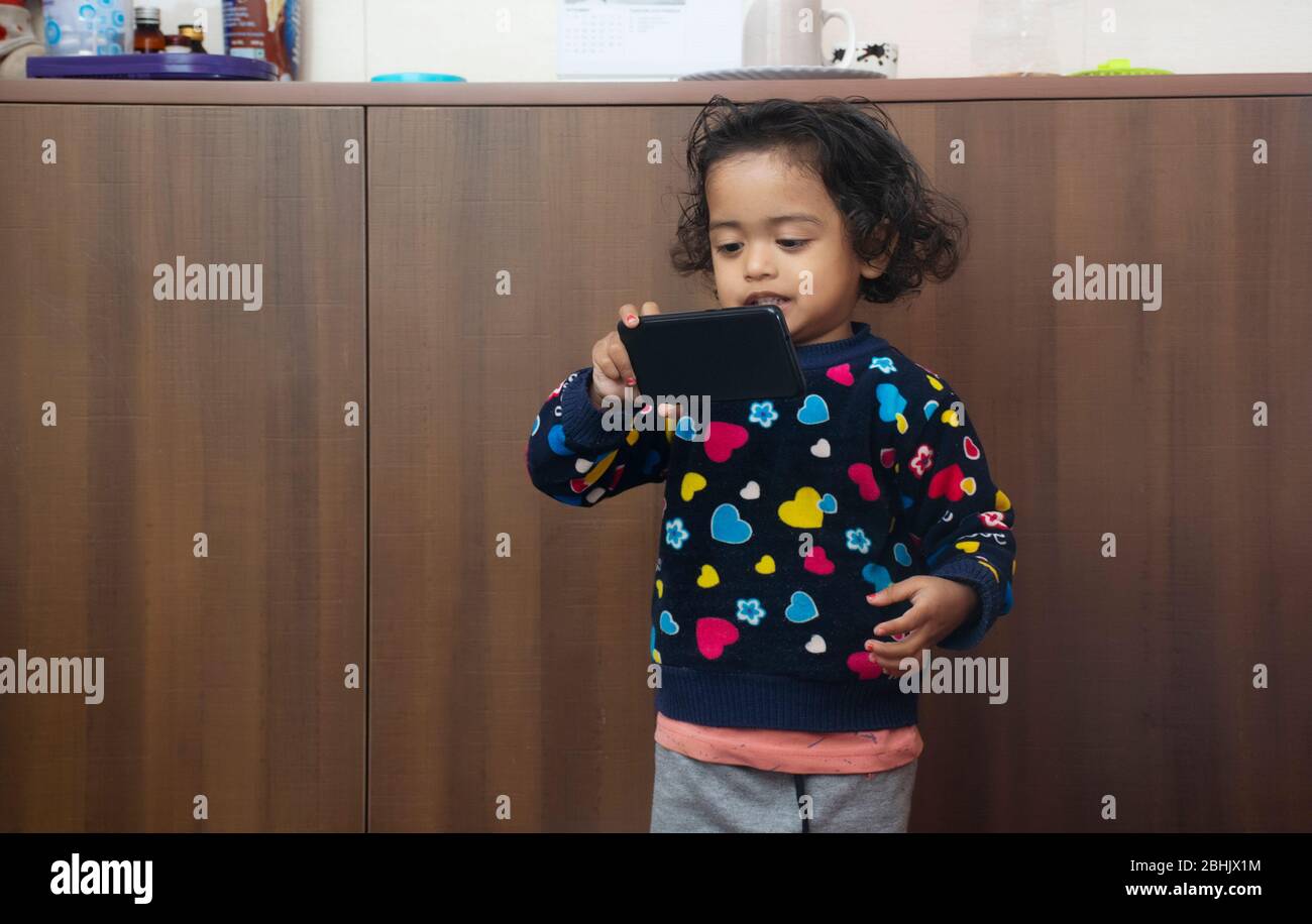 Spoiling children hi-res stock photography and images - Alamy