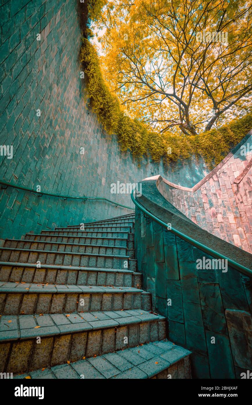 Spiral staircase at daytime in Fort Canning Park, Singapore. Vintage ...