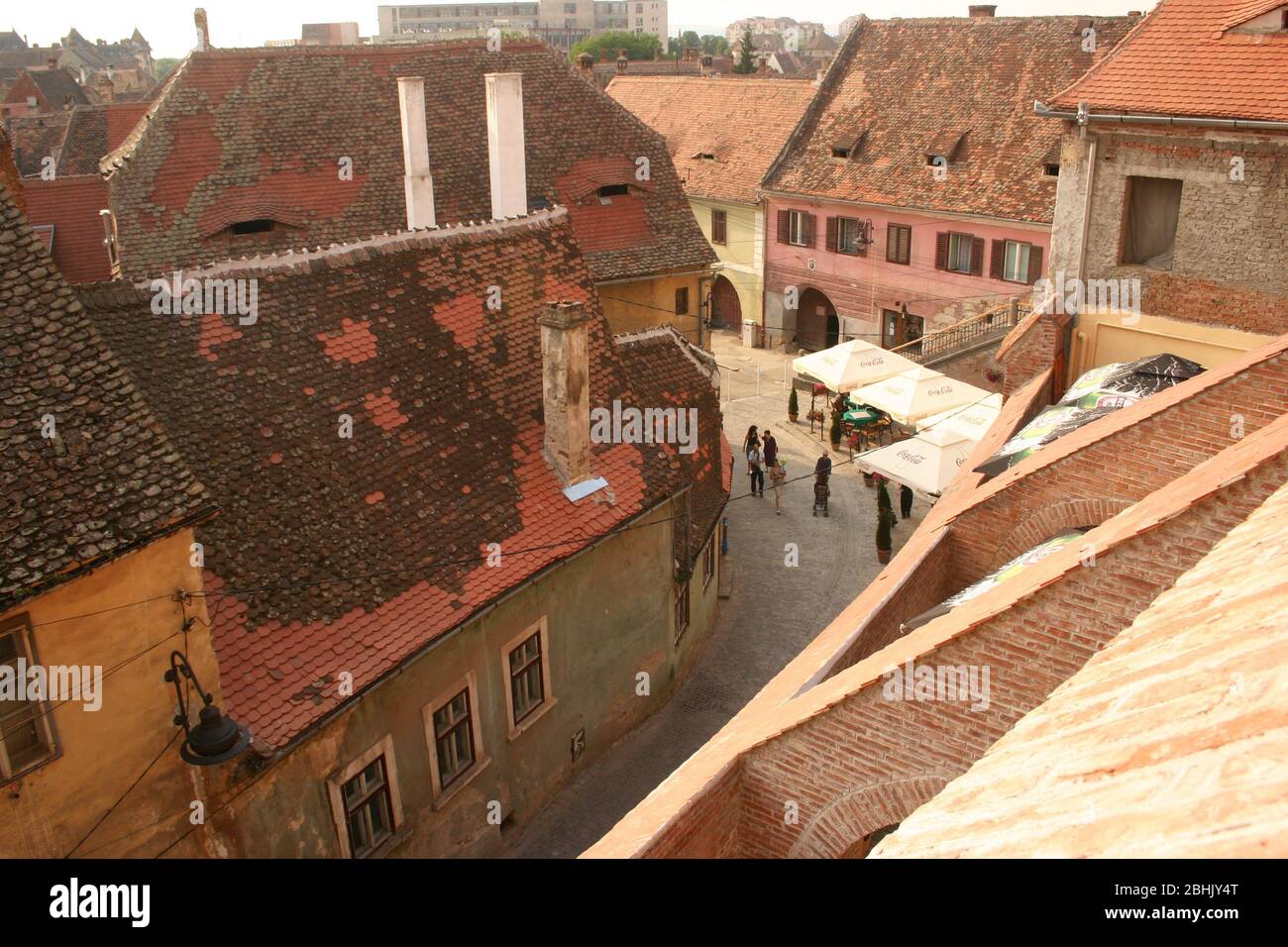 Sibiu, Romania. Medieval era buildings with tiled roofs along the ...