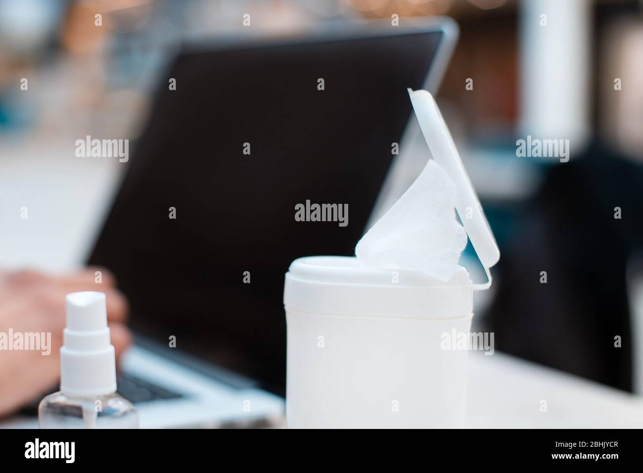 disinfectant spray and germicidal wipes on the office Desk Stock Photo ...