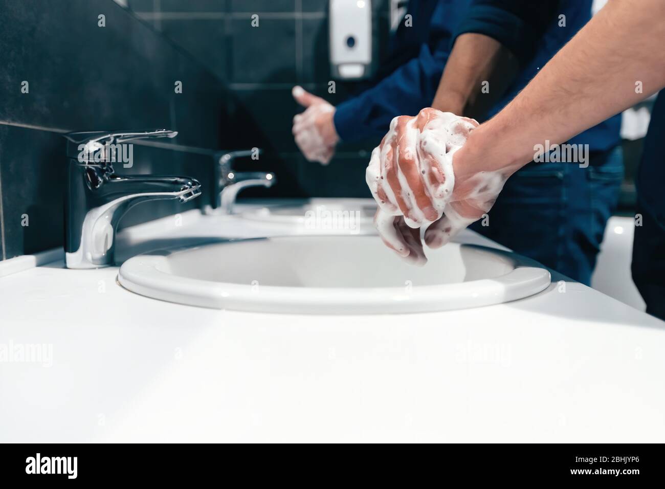 Employees must wash their hands hi-res stock photography and images - Alamy