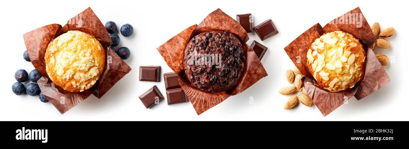 Assorted muffins in brown paper isolated on white background, top view ...