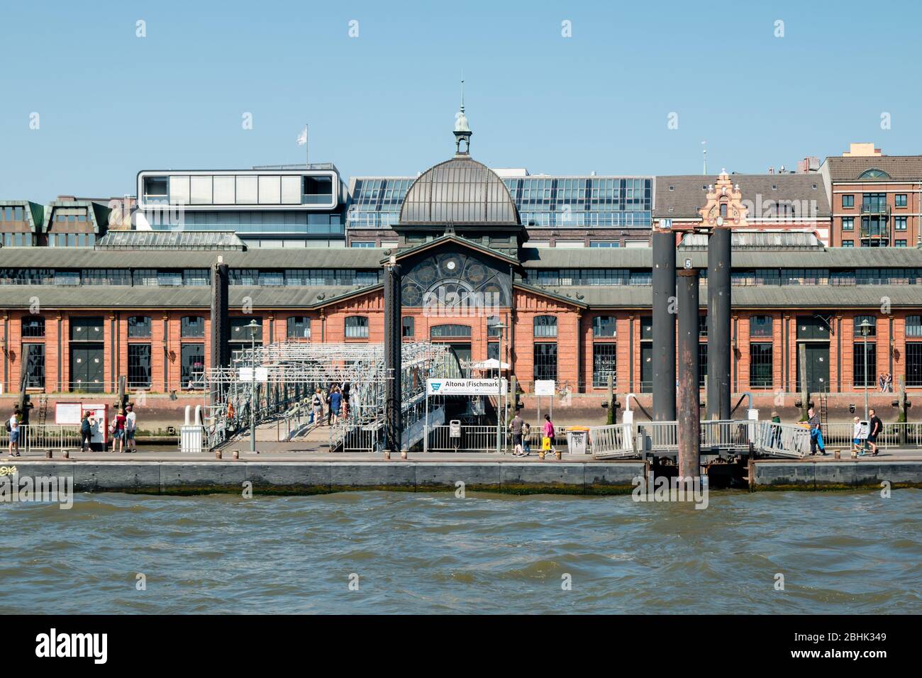 Tourists visiting the Altona Fischmarkt, Fish Market, on the River Elbe ...