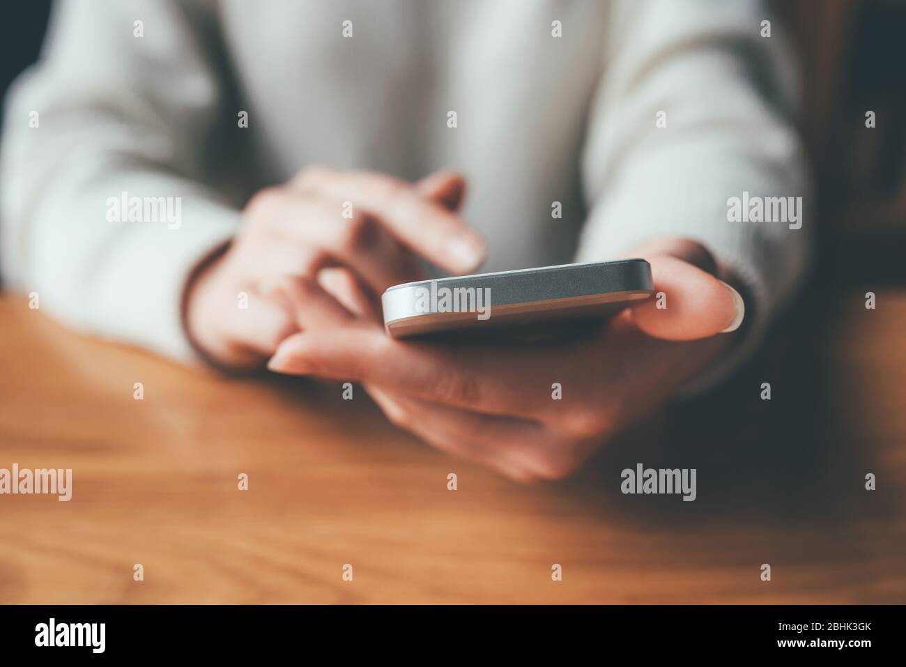 Women's hands use a smartphone for online shopping Stock Photo - Alamy