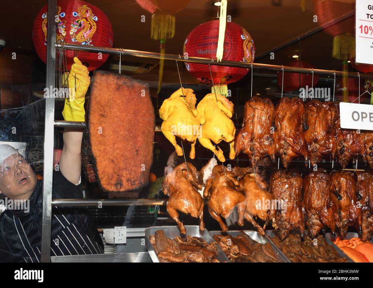 Roasted Ducks Hanging In Window High Resolution Stock Photography and ...