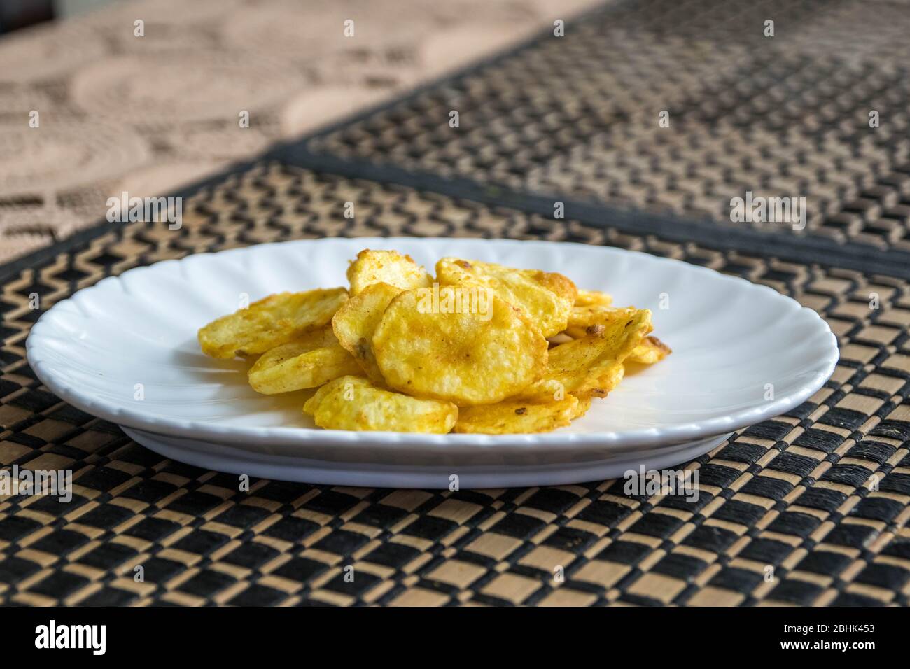potato chips or potato crispy chips being served in the plate Stock ...