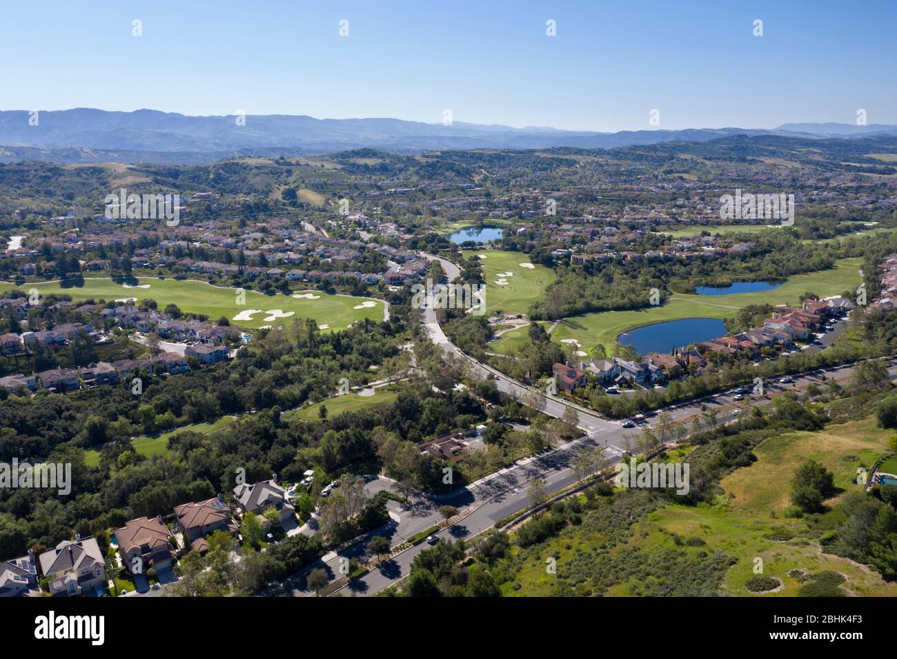 Aerial views above homes and golf course at Coto De Caza in the ...