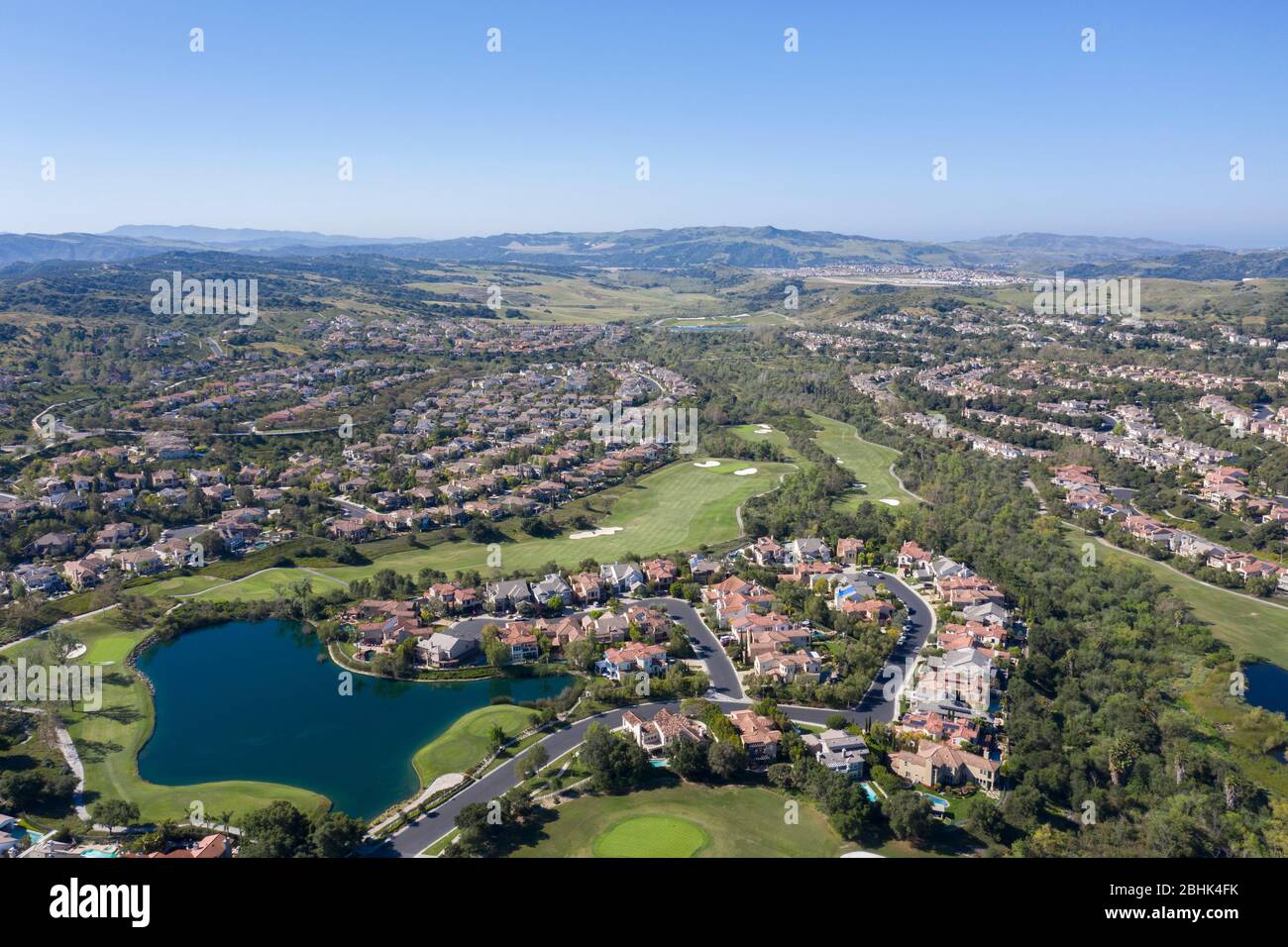 Aerial views above homes and golf course at Coto De Caza in the ...