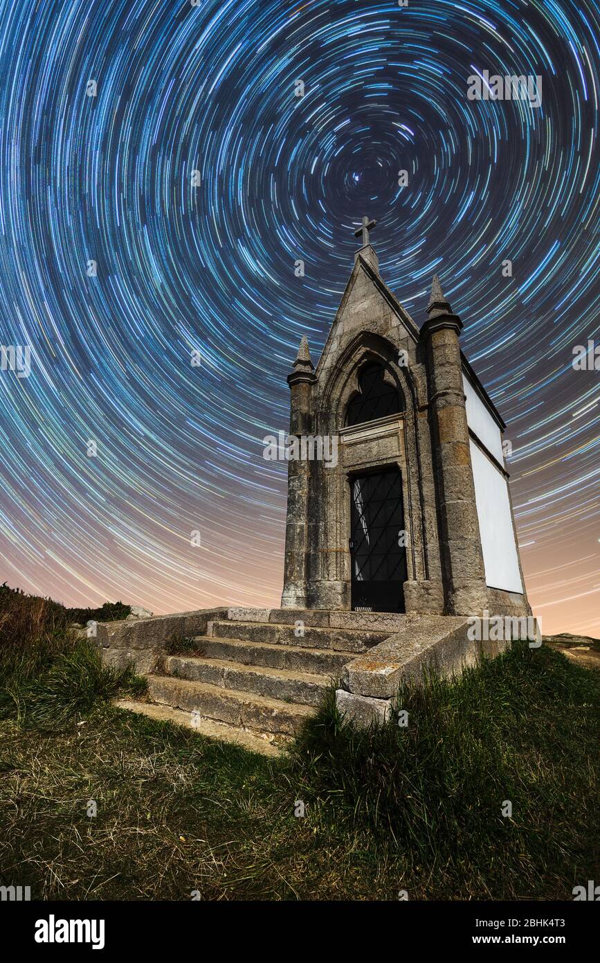 Old white church at night with starry sky and bright colors Stock Photo ...