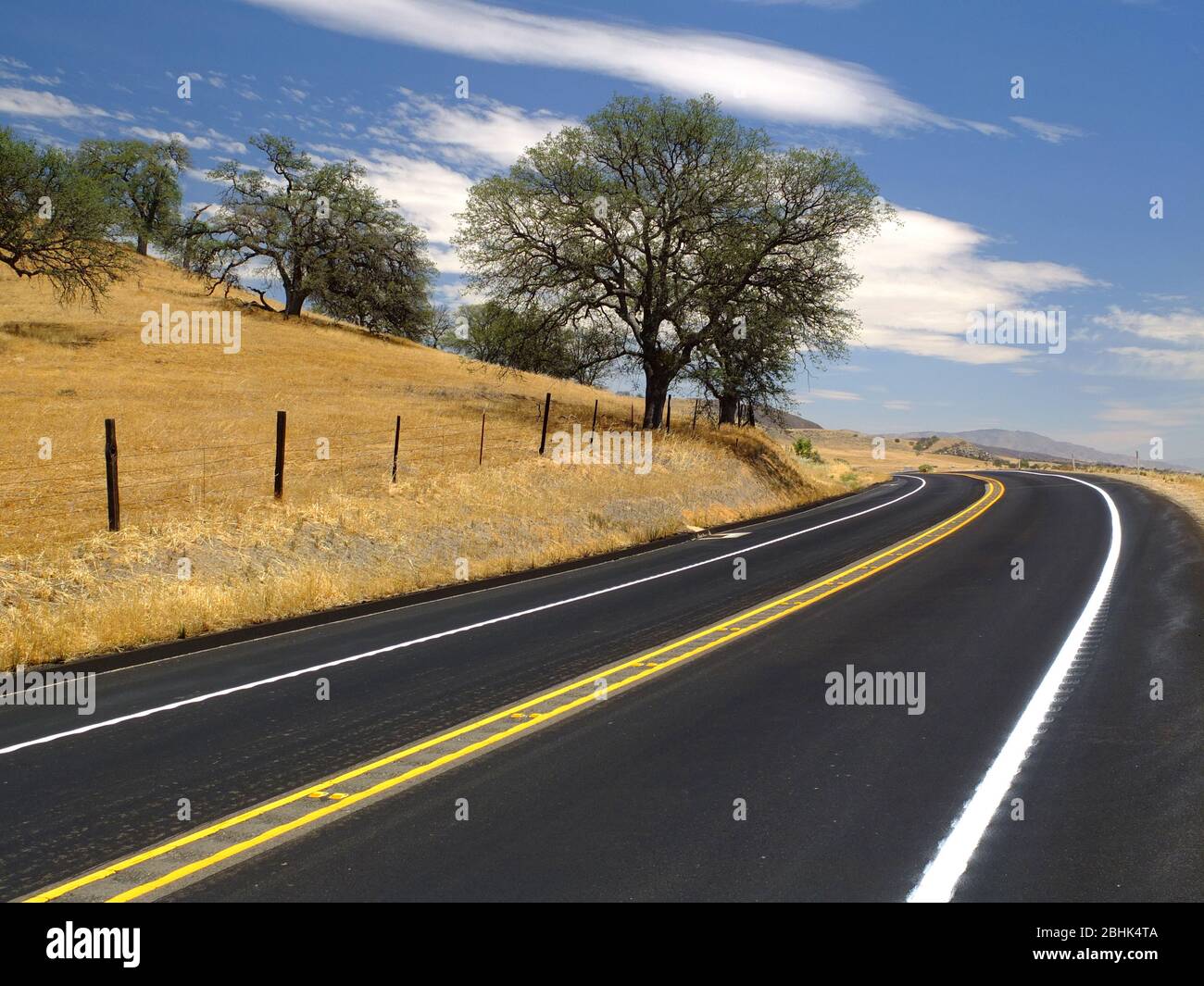 New black curving winding asphalt highway in Central California state ...