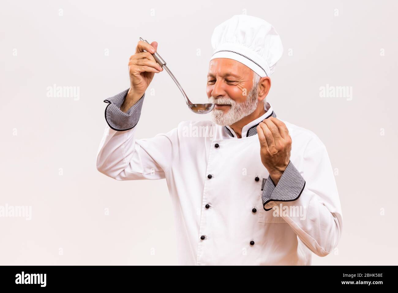 Chef preparing delicious soup hi-res stock photography and images - Alamy