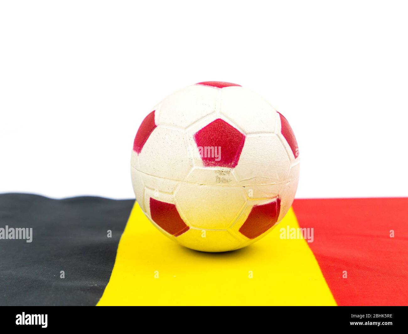 Soccer ball on the background of the flag of Belgium Stock Photo - Alamy