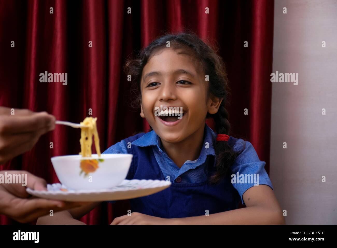 children with surprised face and food, India Stock Photo - Alamy