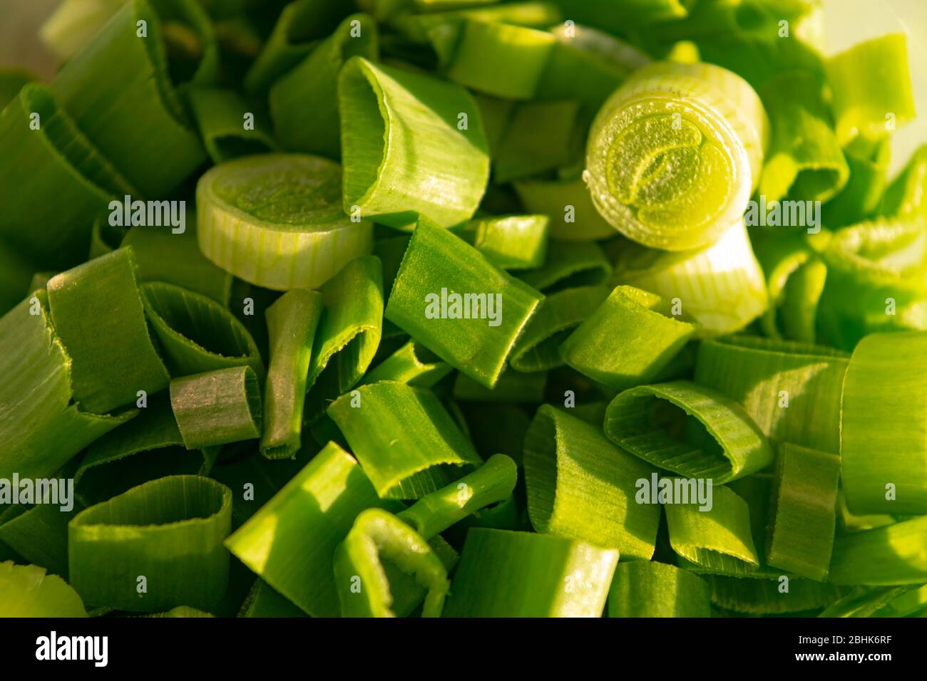 Sliced green onions, the texture of the surface. Close up. Background ...