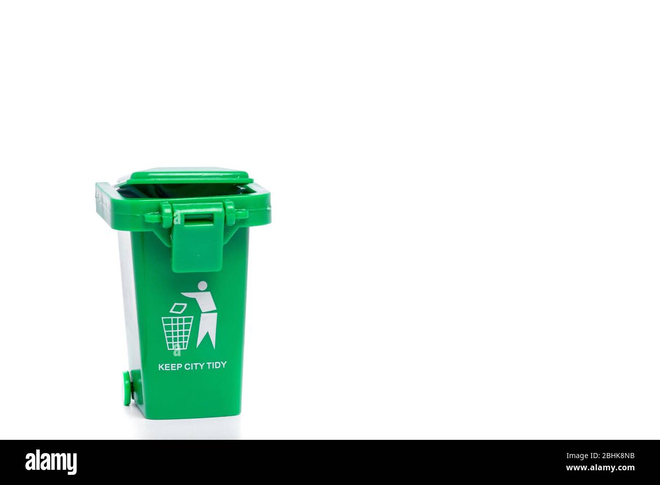 Green garbage, trash bin isolated on white background Stock Photo - Alamy