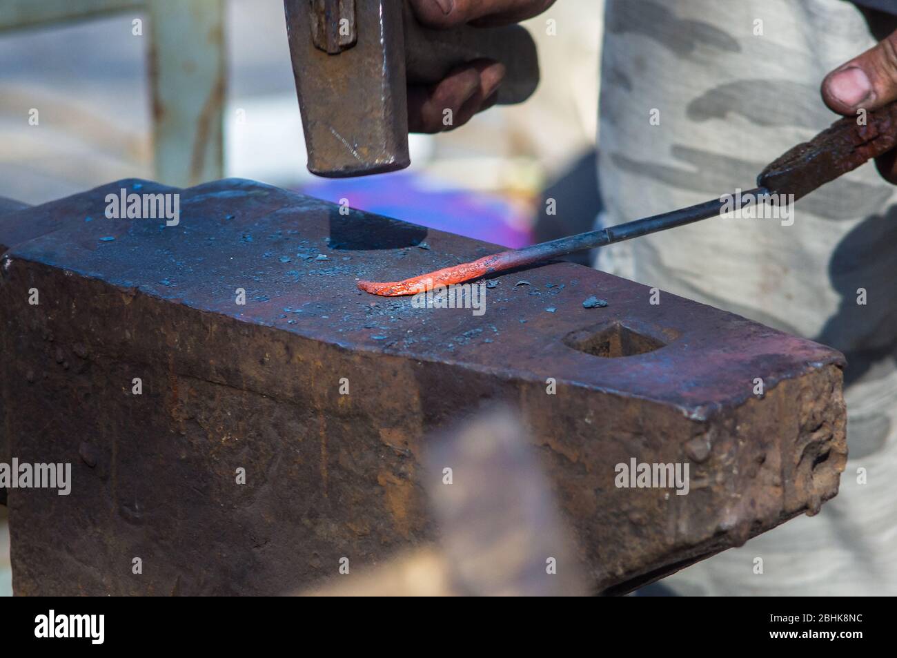 Blacksmith manually forging molten fire hi-res stock photography and ...