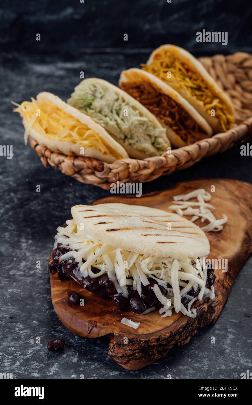 Top view of various types of typical Venezuelan arepas in a woven ...