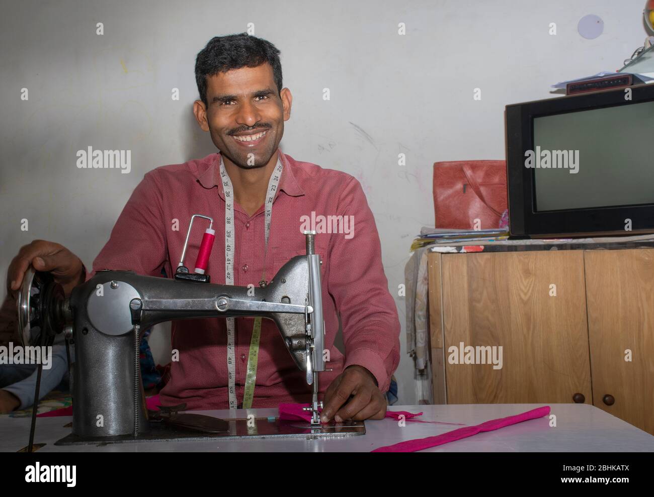 Man working on sewing machine hi-res stock photography and images - Alamy