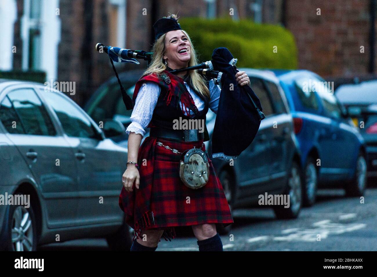Female scottish piper plays bagpipes hi-res stock photography and ...