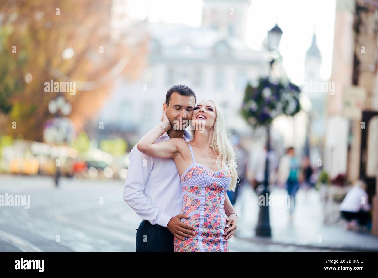 Romantic tourist couple walking around the city relaxing Stock Photo ...