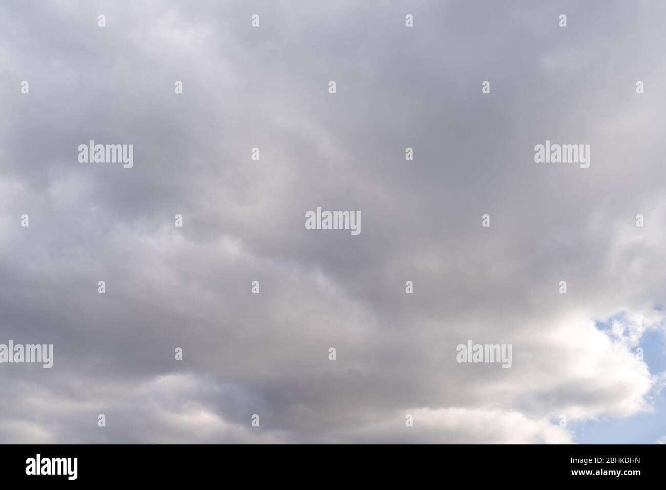 Cloudy heavy dark gray sky. from the window of a high-rise building ...