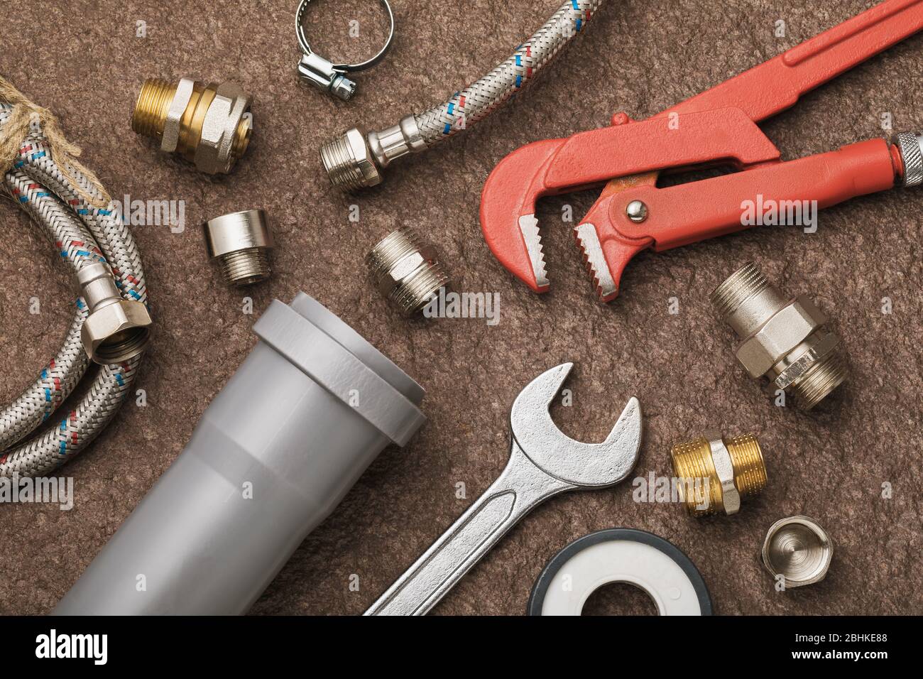 Various plumbing tools for connecting faucets and sewers, top view ...