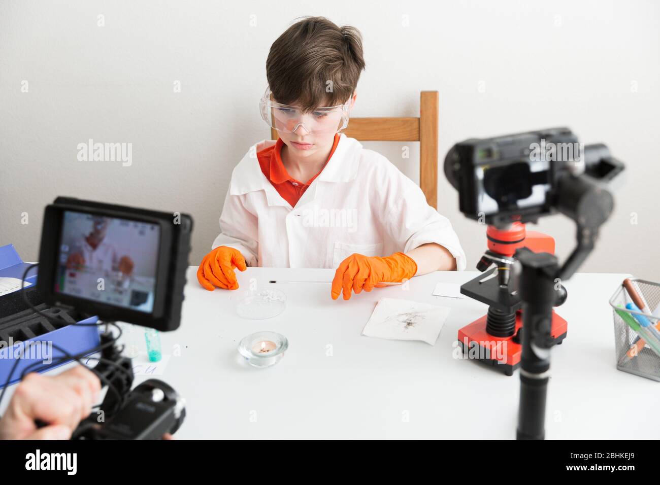 9 year old boy makes educational video about chemical experiments for ...