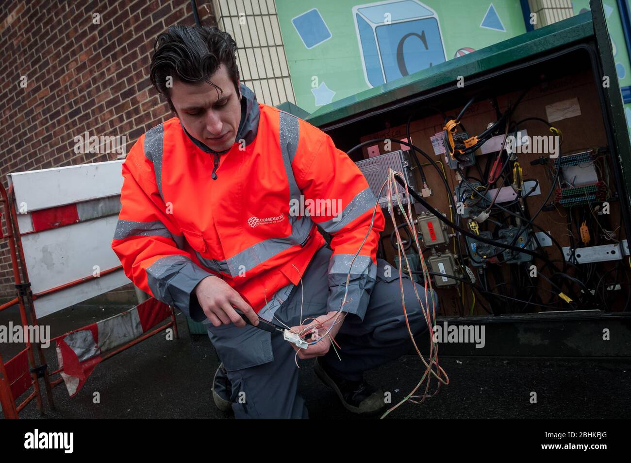 Virgin Media Engineers installing Stock Photo - Alamy