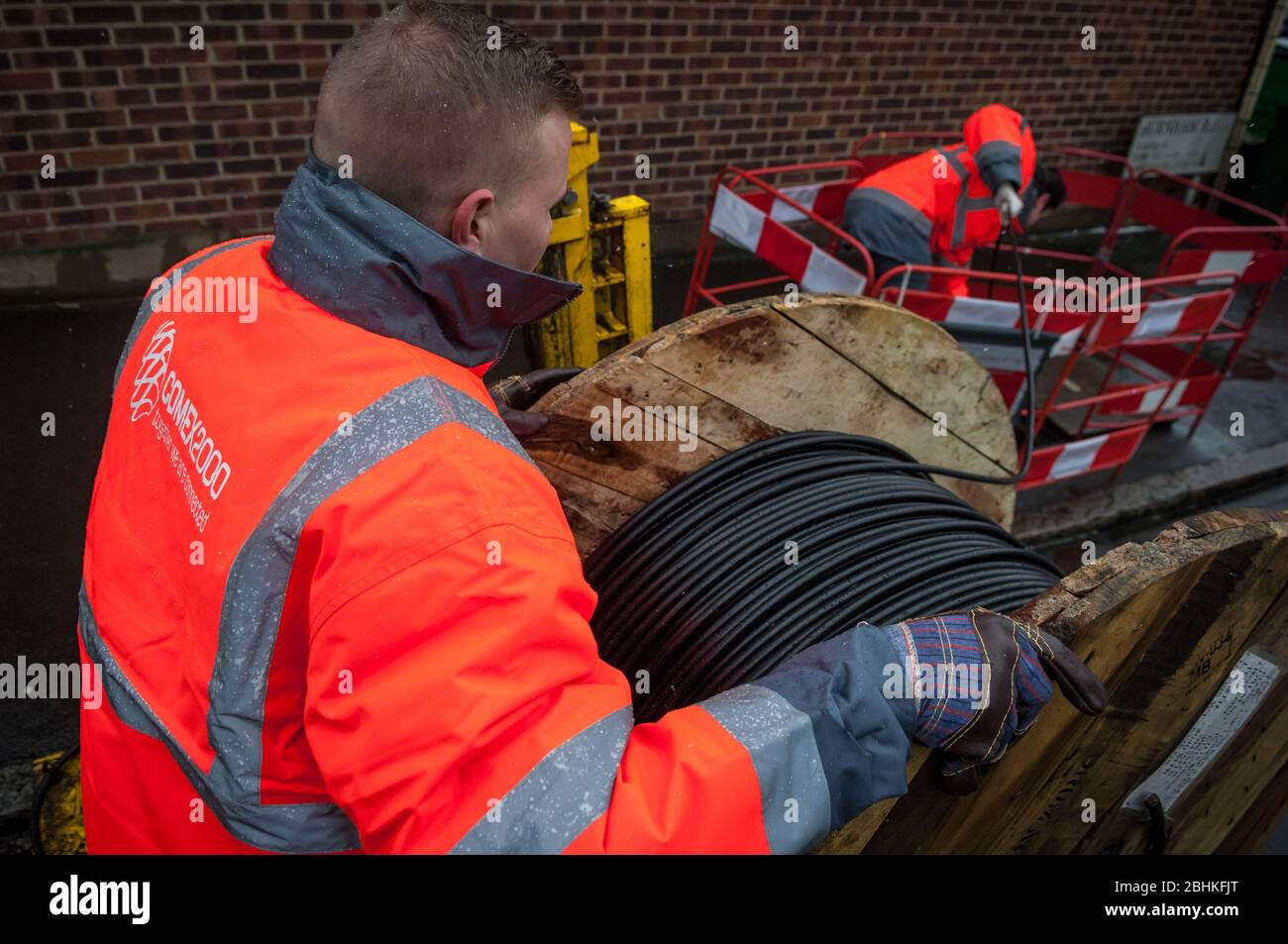 Virgin Media Engineers installing Stock Photo - Alamy