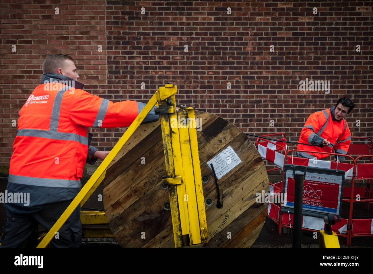 Virgin Media Engineers installing Stock Photo - Alamy