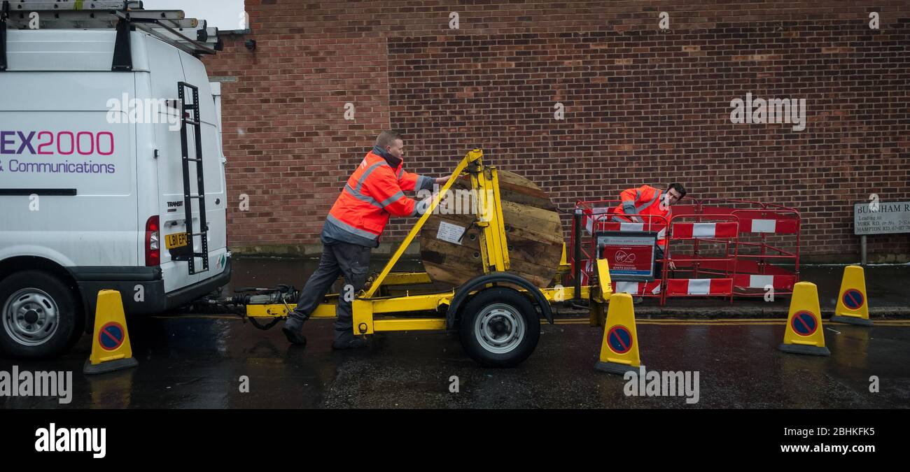 Virgin Media Engineers installing Stock Photo - Alamy