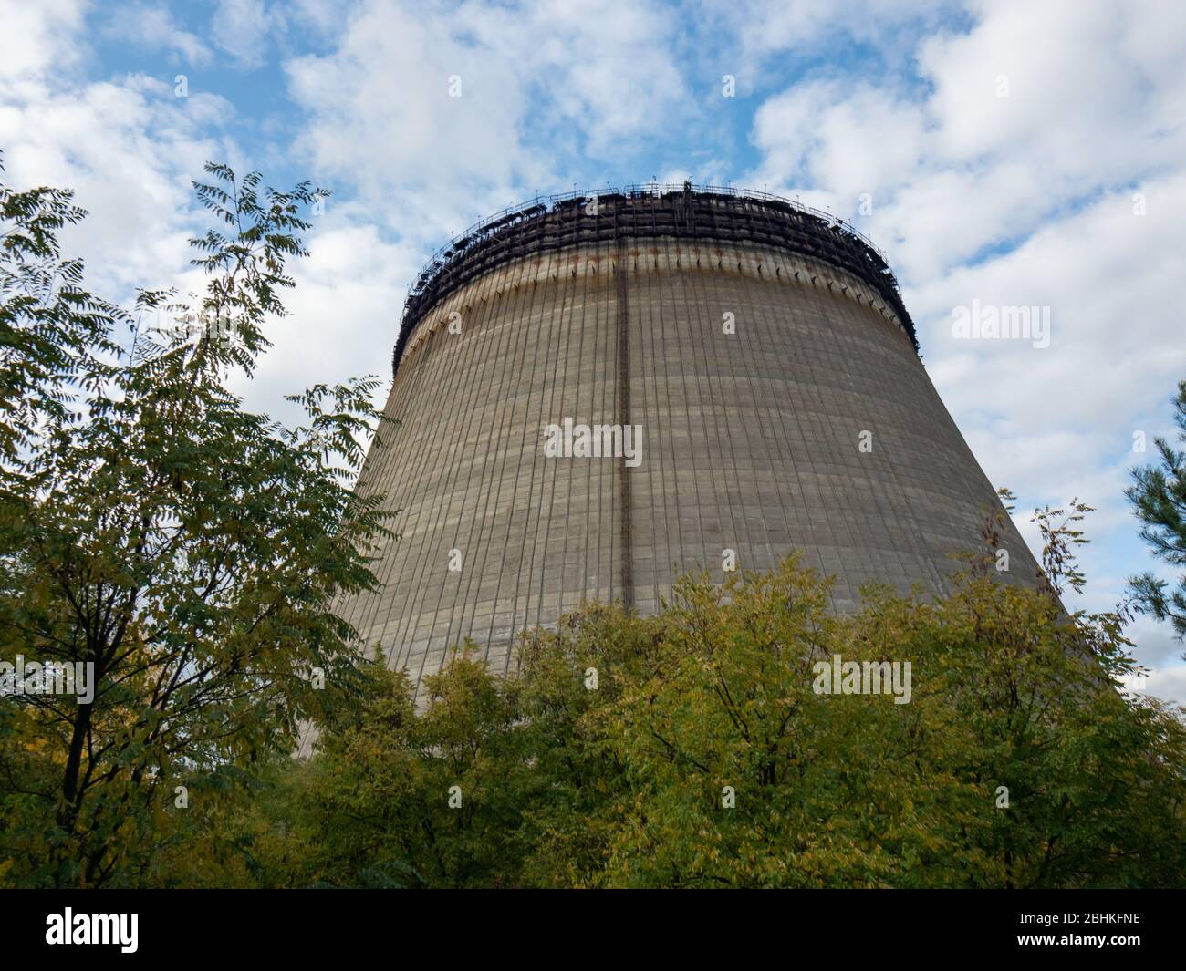Unfinished cooling tower in Chernobyl zone at afternoon, fall season ...