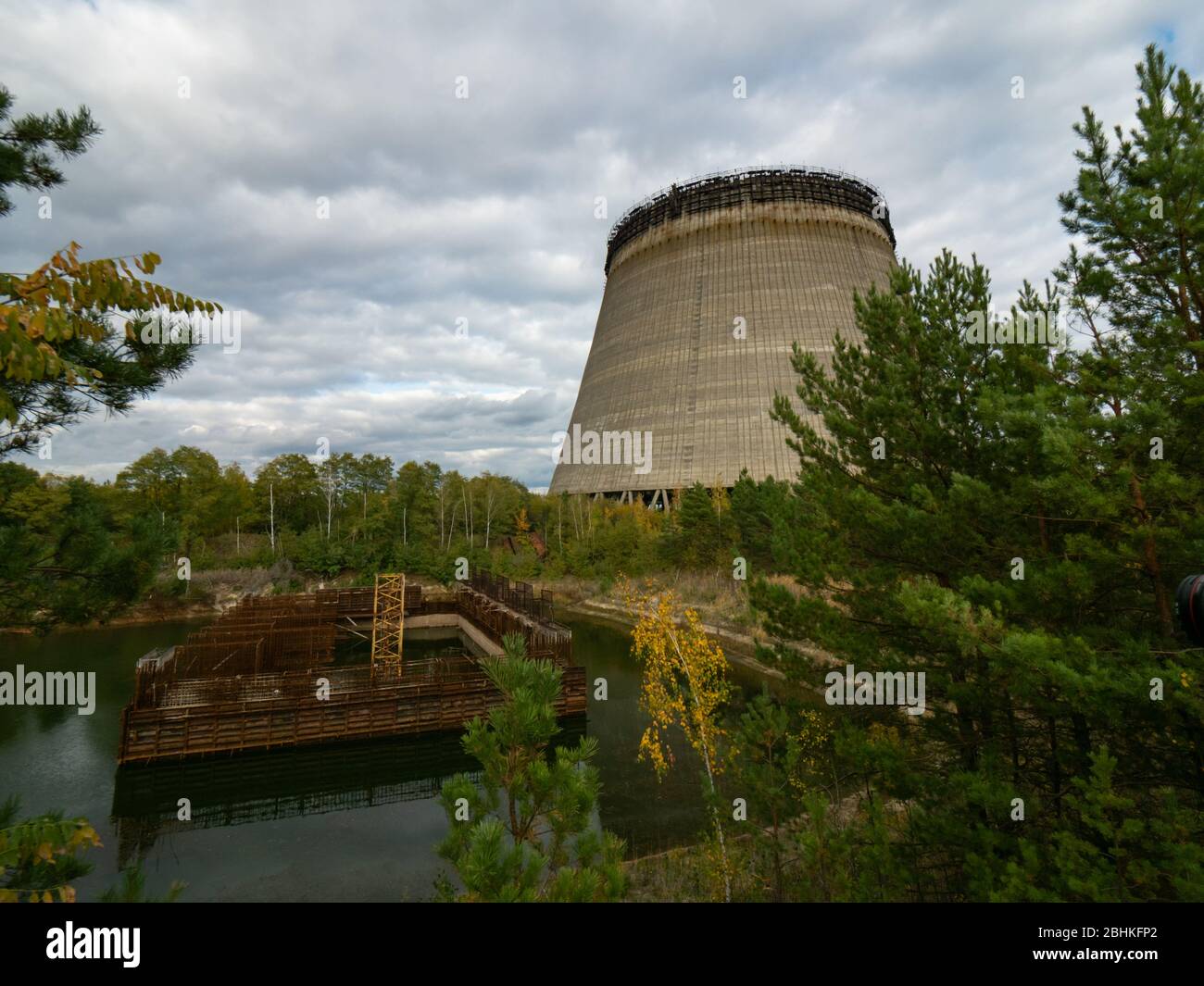 Unfinished cooling tower in Chernobyl zone at afternoon, fall season ...