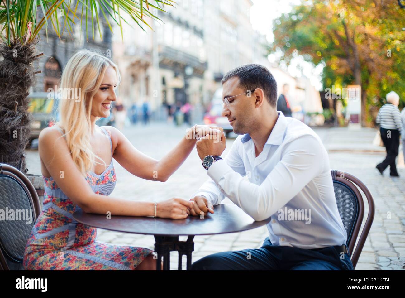 Romantic tourist couple walking around the city relaxing Stock Photo ...