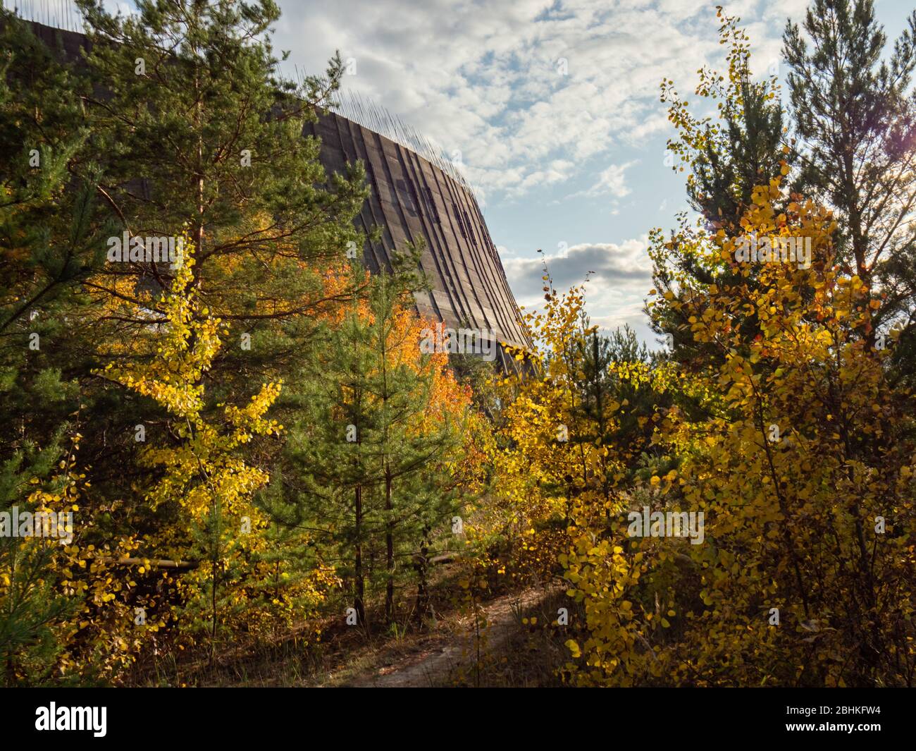 Unfinished cooling tower in Chernobyl zone at afternoon, fall season ...